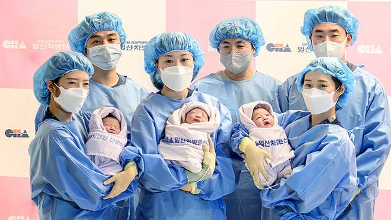 Year of the Blue Snake begins with birth of three babies at midnight